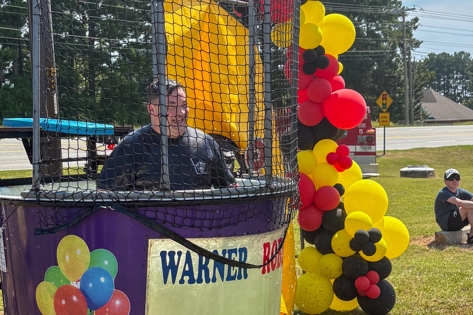 Operation Arresting Hunger washes cars, dunks officials at annual ...