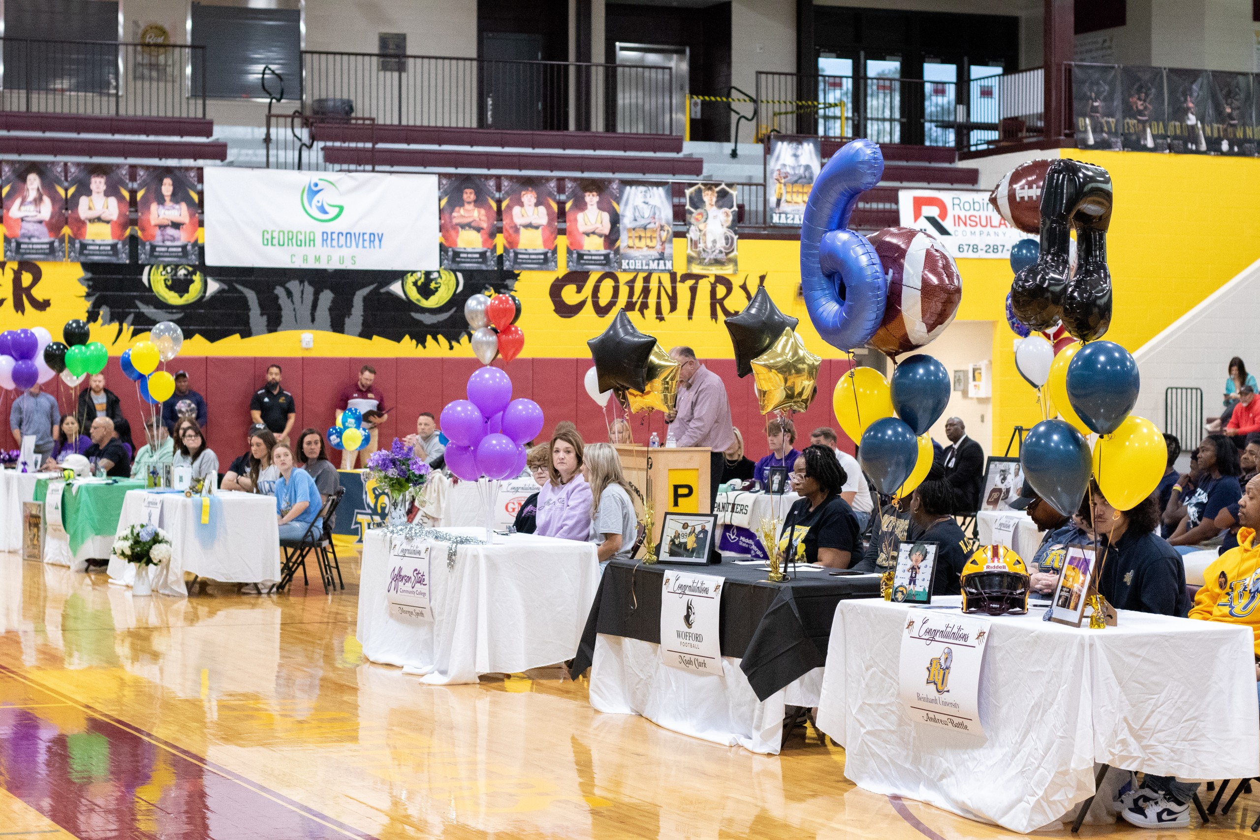Houston County, Perry and Warner Robins sign 22 athletes on National ...