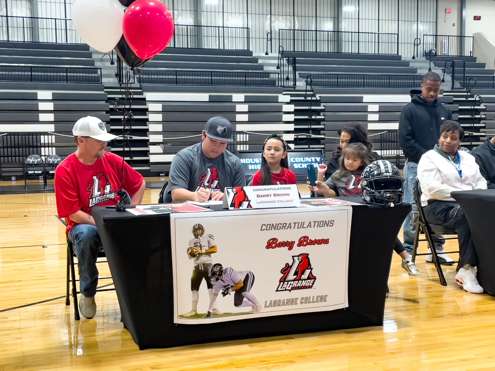 Houston County, Perry and Warner Robins sign 22 athletes on National ...